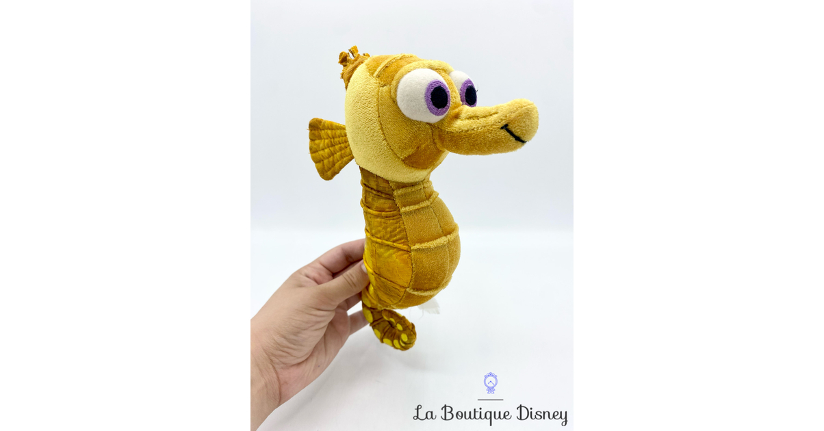 Peluche Hippo Sheldon Le monde de Némo Disney Store hippocampe jaune 24 ...